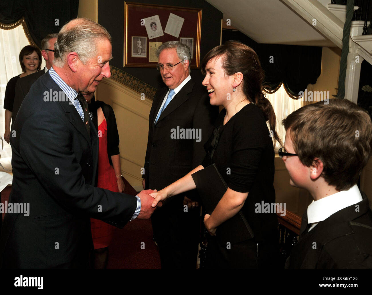 The prince of wales charles hands with chorister catherine stuart hi ...