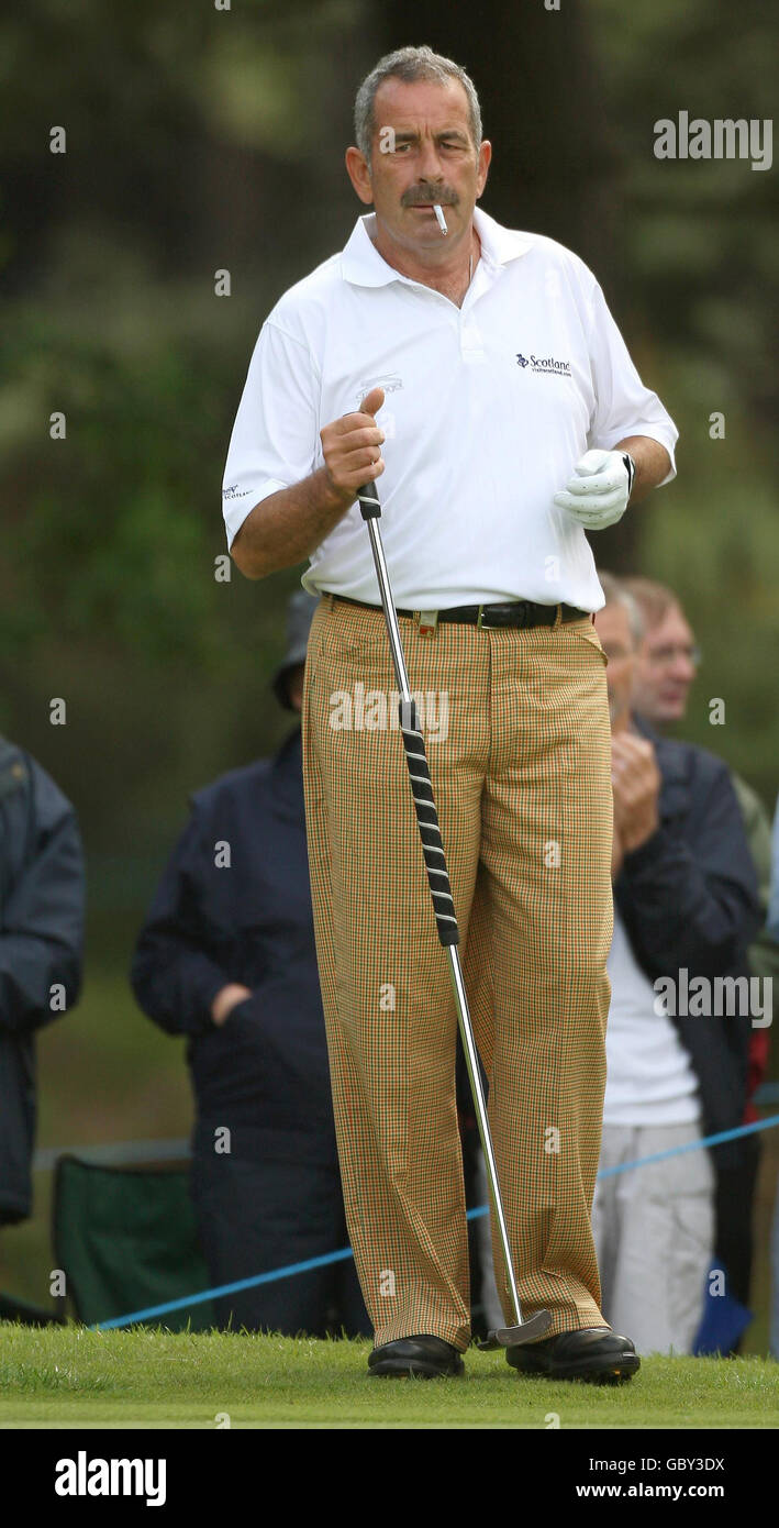 Scotland's Sam Torrance smokes a cigarette during Round Two of the ...