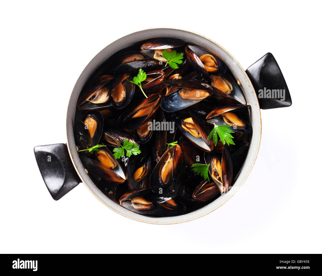 Mussels in copper pot. Isolated on white background. Top view Stock ...