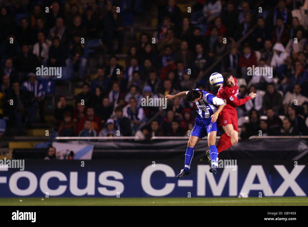 Deportivo La Coruna's Albert Luque (l) and Liverpool's Josemi battle ...
