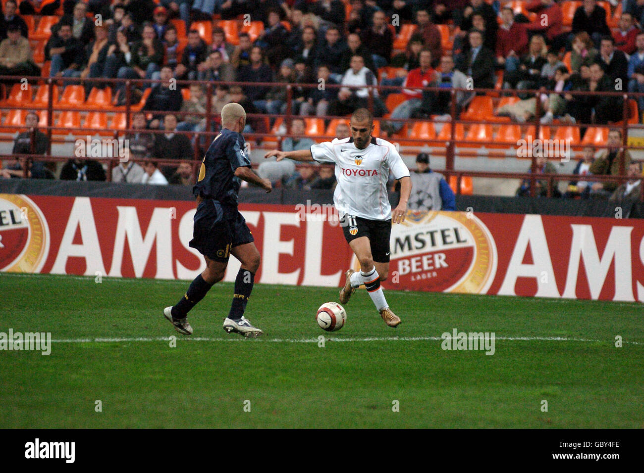 Inter Milan's Ze Maria (l) puts pressure on Valencia's Marco Di Vaio (r ...