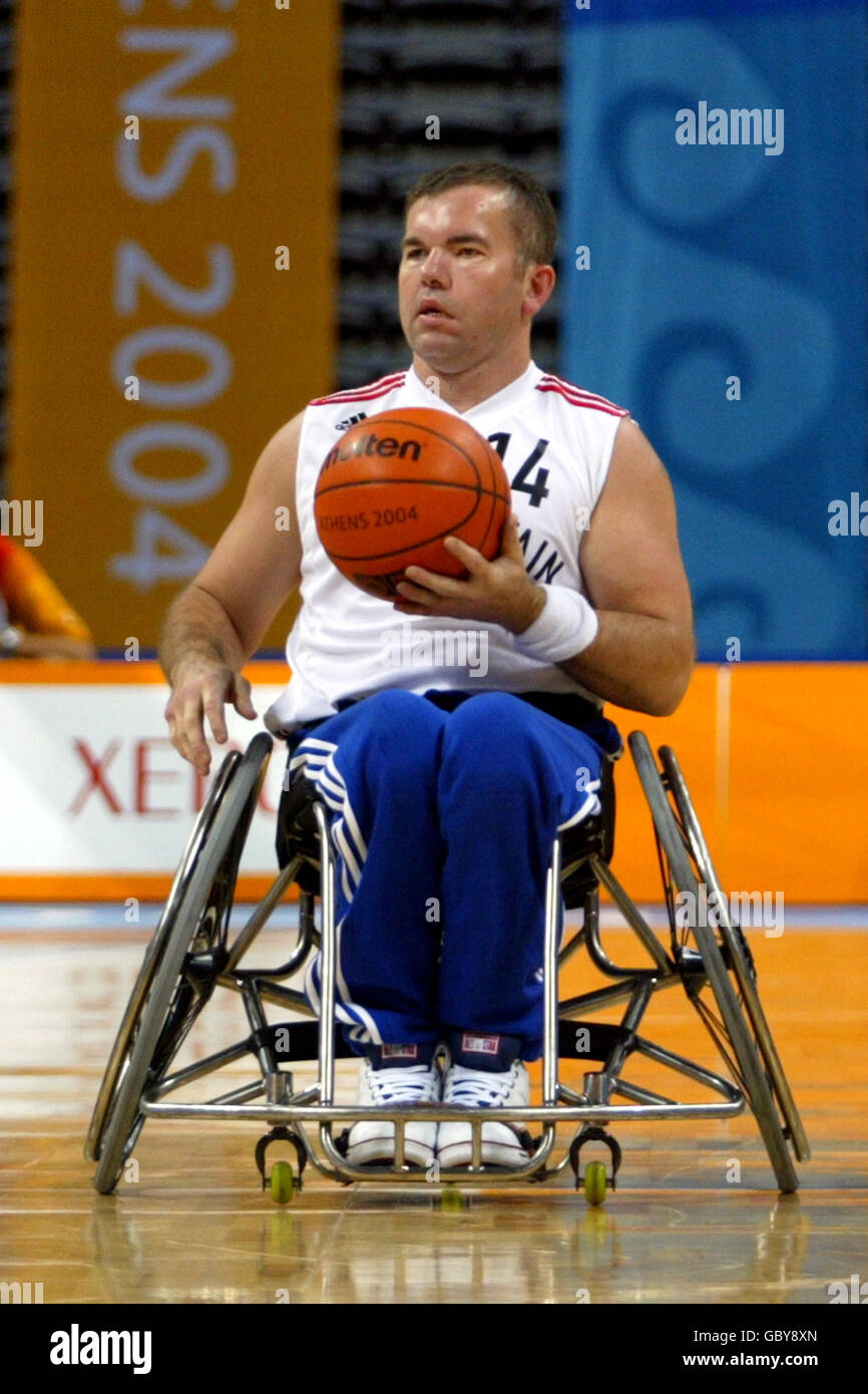 Great Britain's Colin Price looks for options before making a pass ...