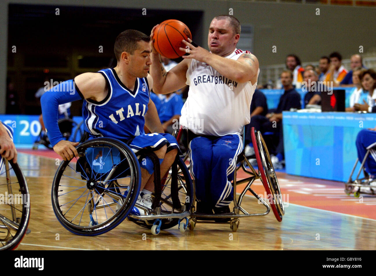 Great Britain's Jon Pollock is stopped in his tracks by the Italian ...