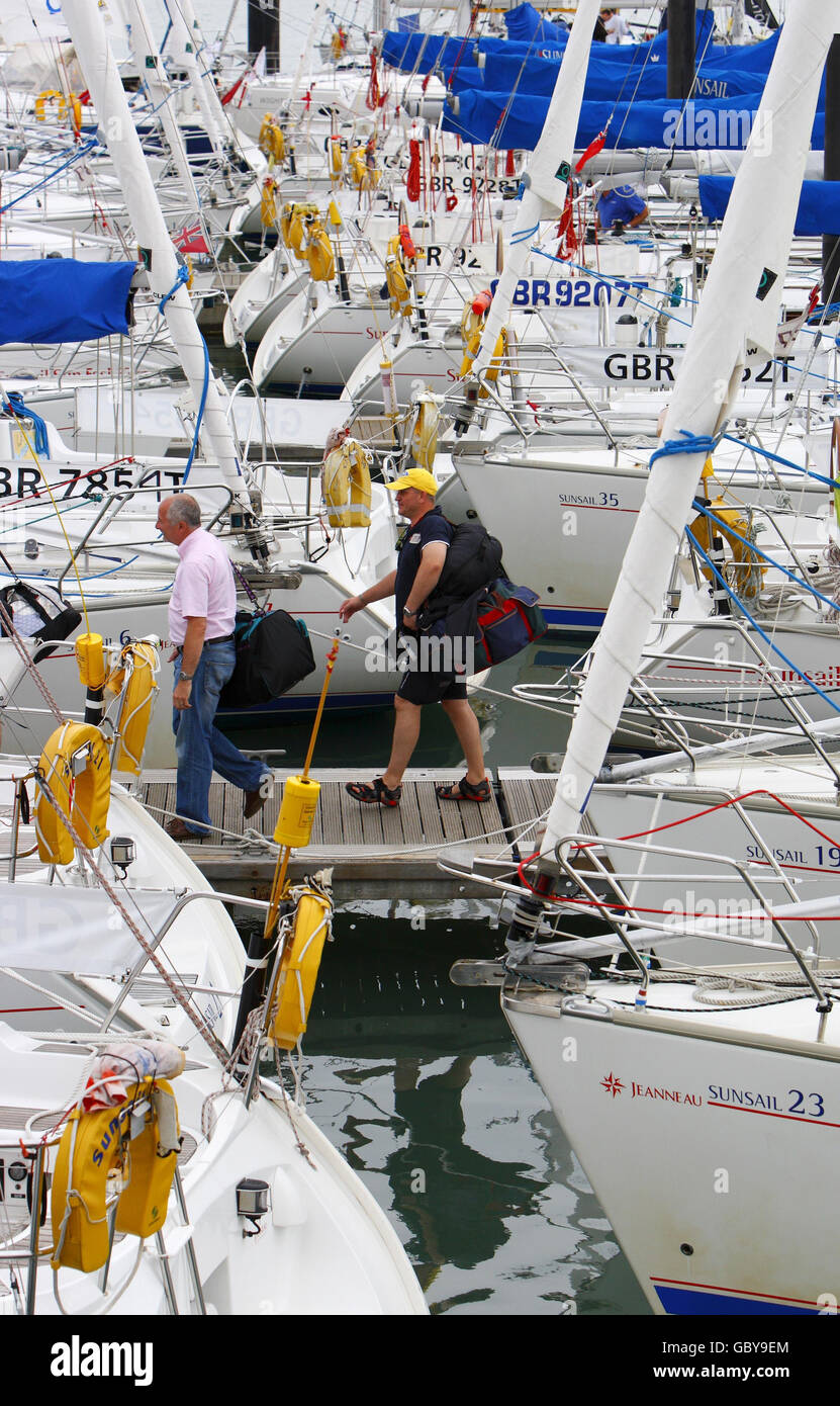 Sailors head home after a hard day's sailing at Cowes Week, the world ...