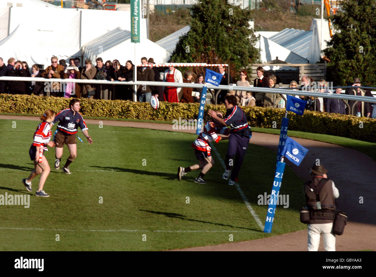 Horse Racing - Cheltenham Races. A mini rugby match is played in ...