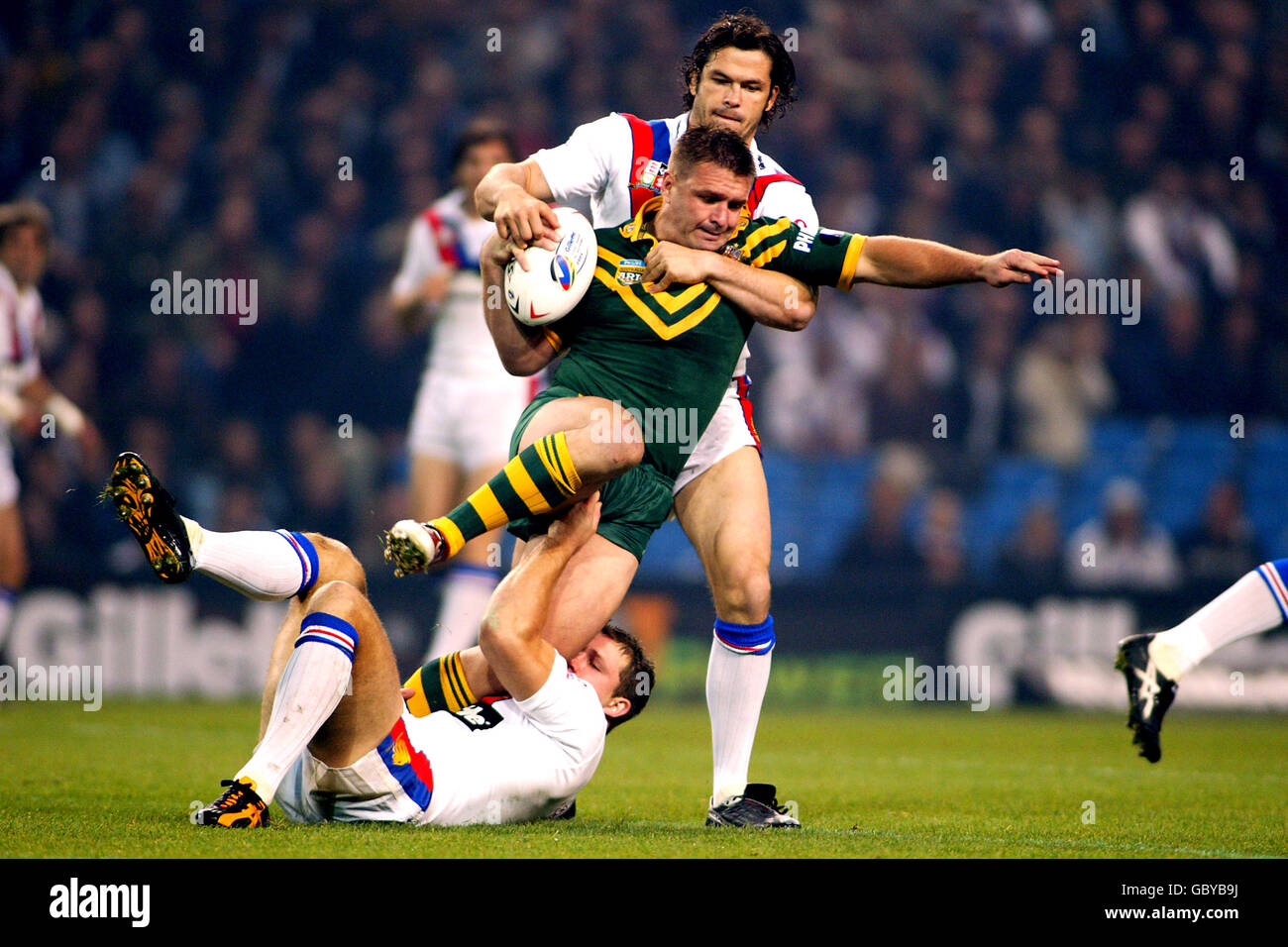 Great Britain's Andrew Farrell (top) and Stuart Fielden (bottom) tackle ...