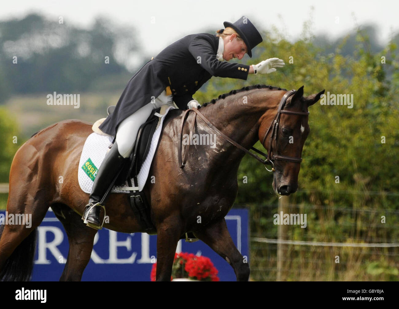 Ruth Edge pats her horse Mayhem III after they had completed the ...