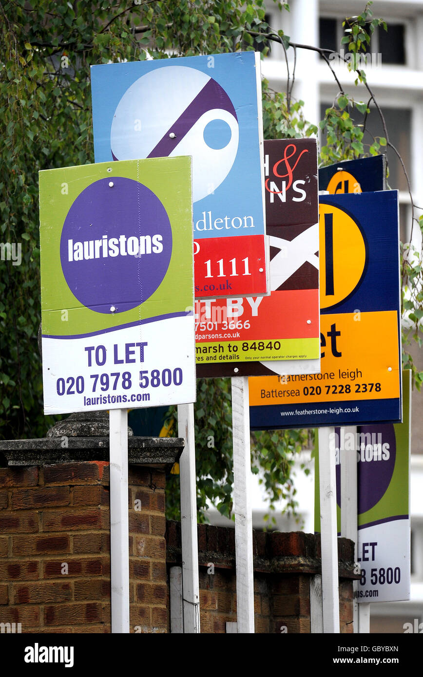 Estate agents' boards in Clapham, London. PRESS ASSOCIATION Photo ...