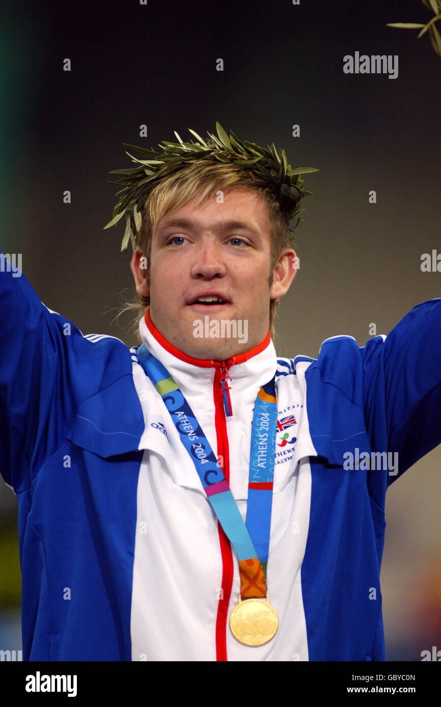 Athletics top half stock gold medal hi-res stock photography and images ...