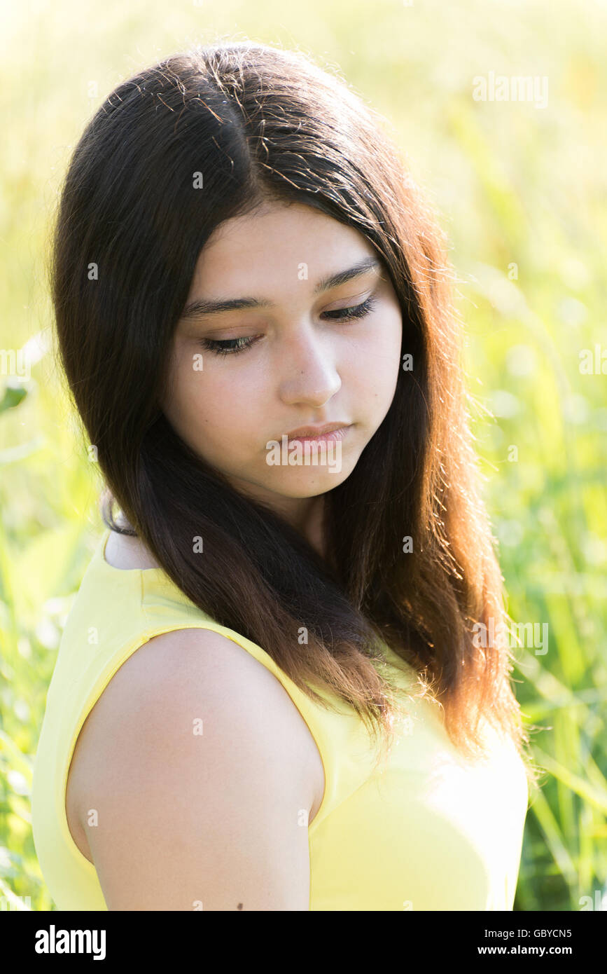 Girl 14 years in summer field Stock Photo - Alamy