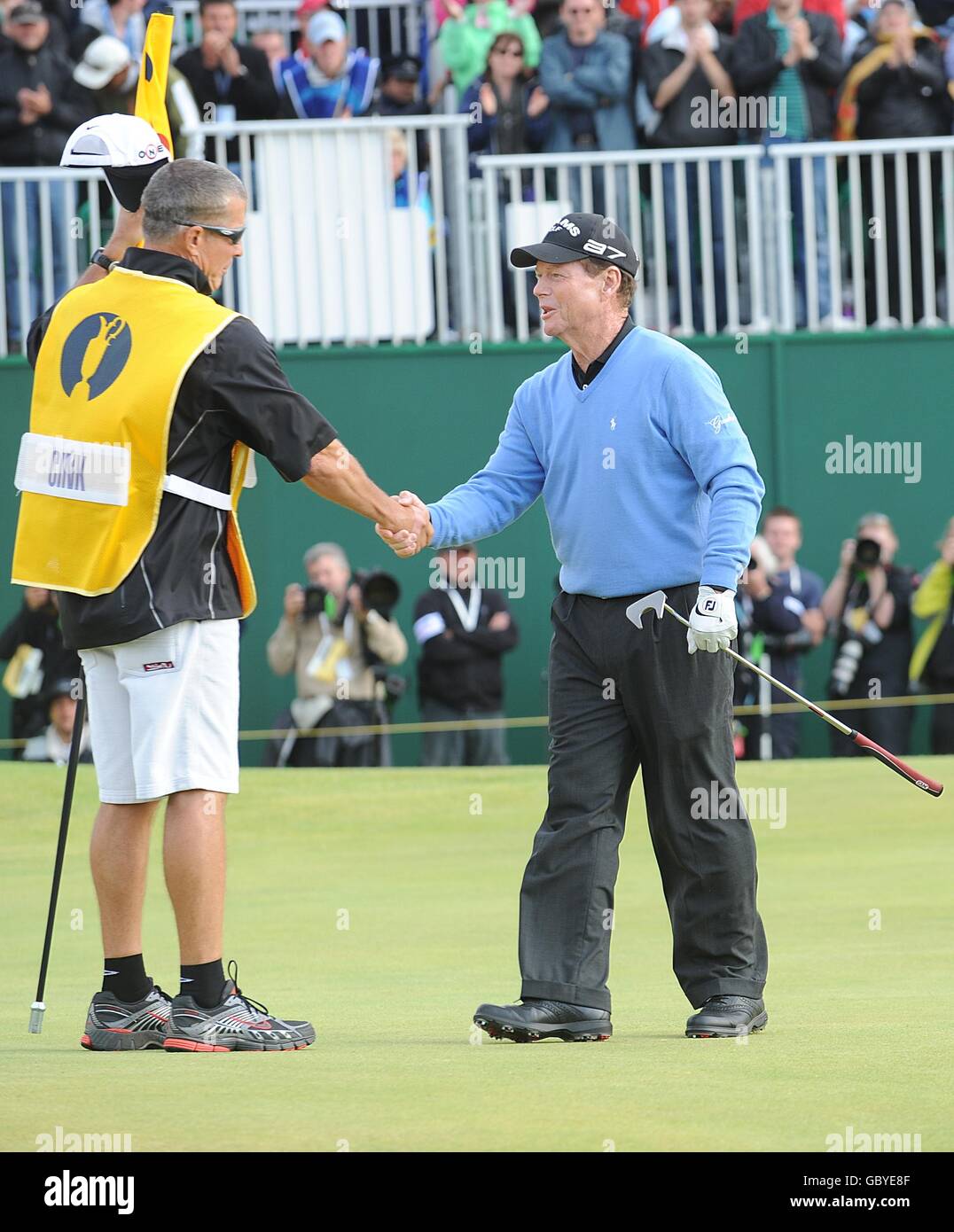 USA's Stewart Cink's caddie Frank Williams (left) shakes hands with Tom ...