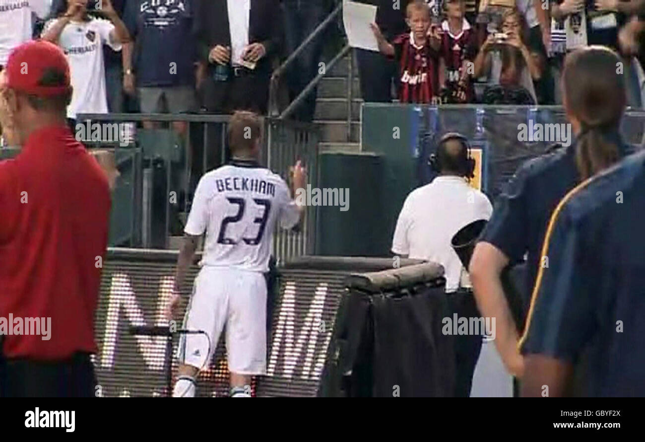 Grab taken from video showing David Beckham (wearing No. 23, white ...