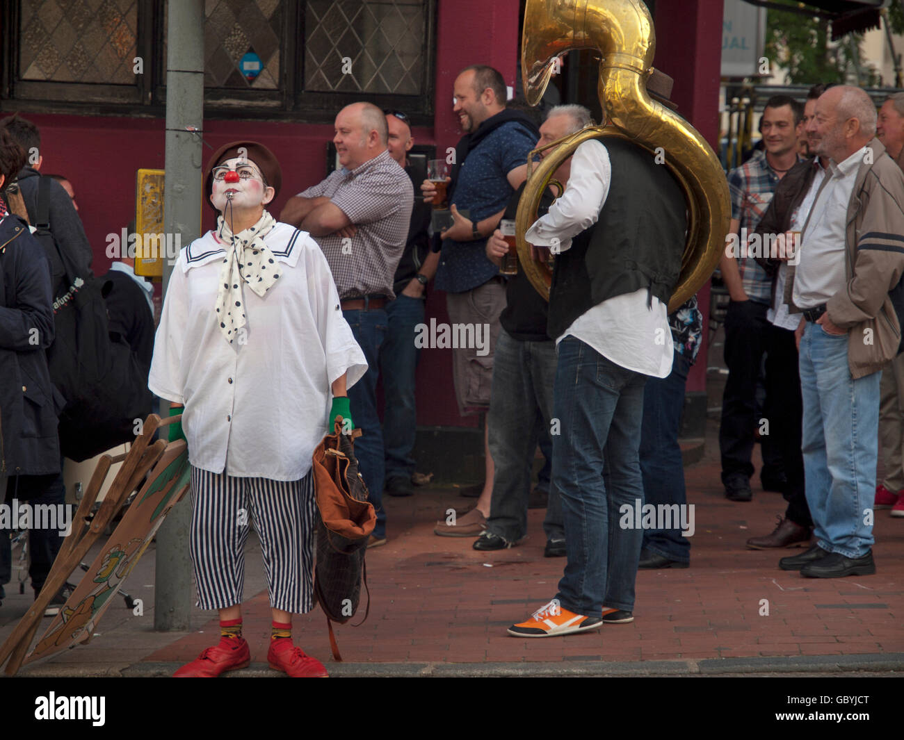 In Brighton a clown waits to cross the road Stock Photo - Alamy
