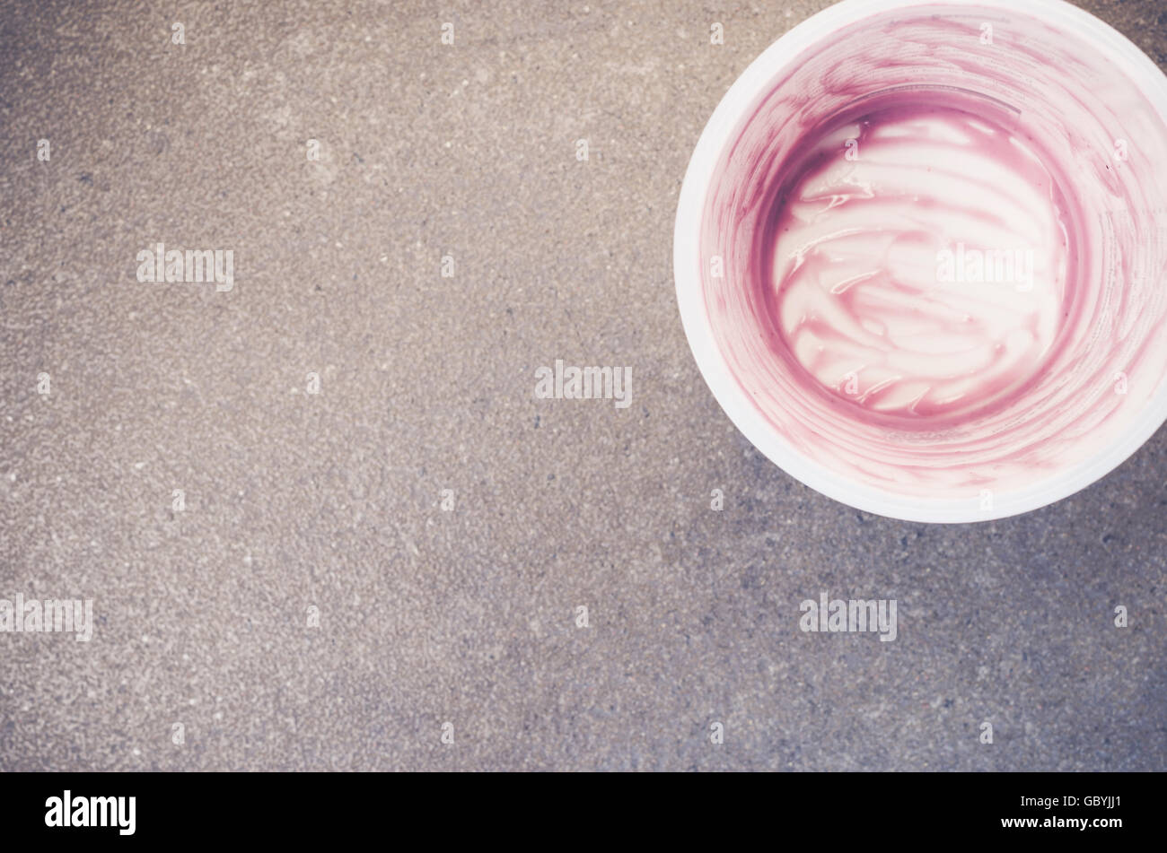 empty plastic yogurt can Stock Photo - Alamy