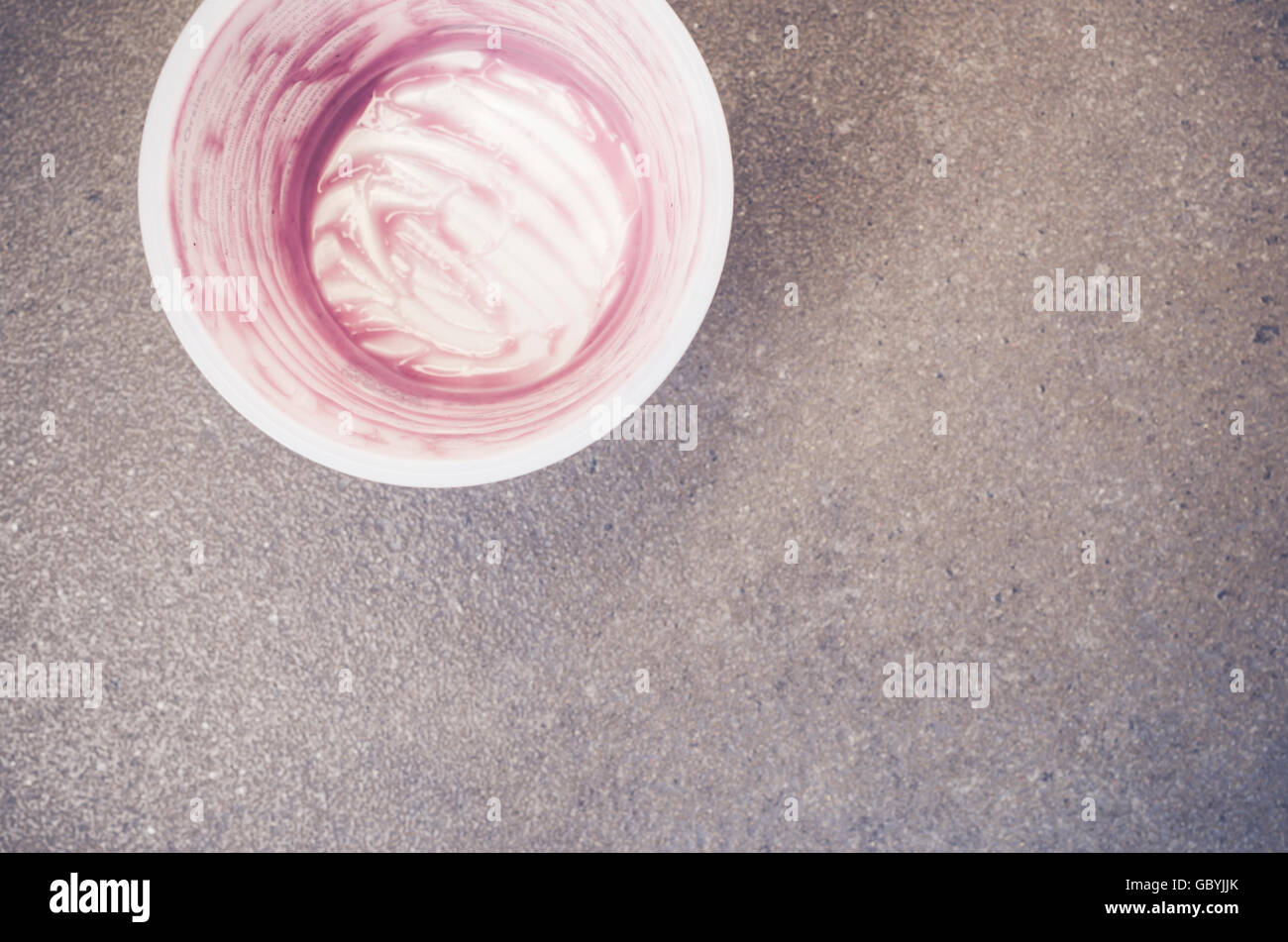 empty plastic yogurt can Stock Photo - Alamy