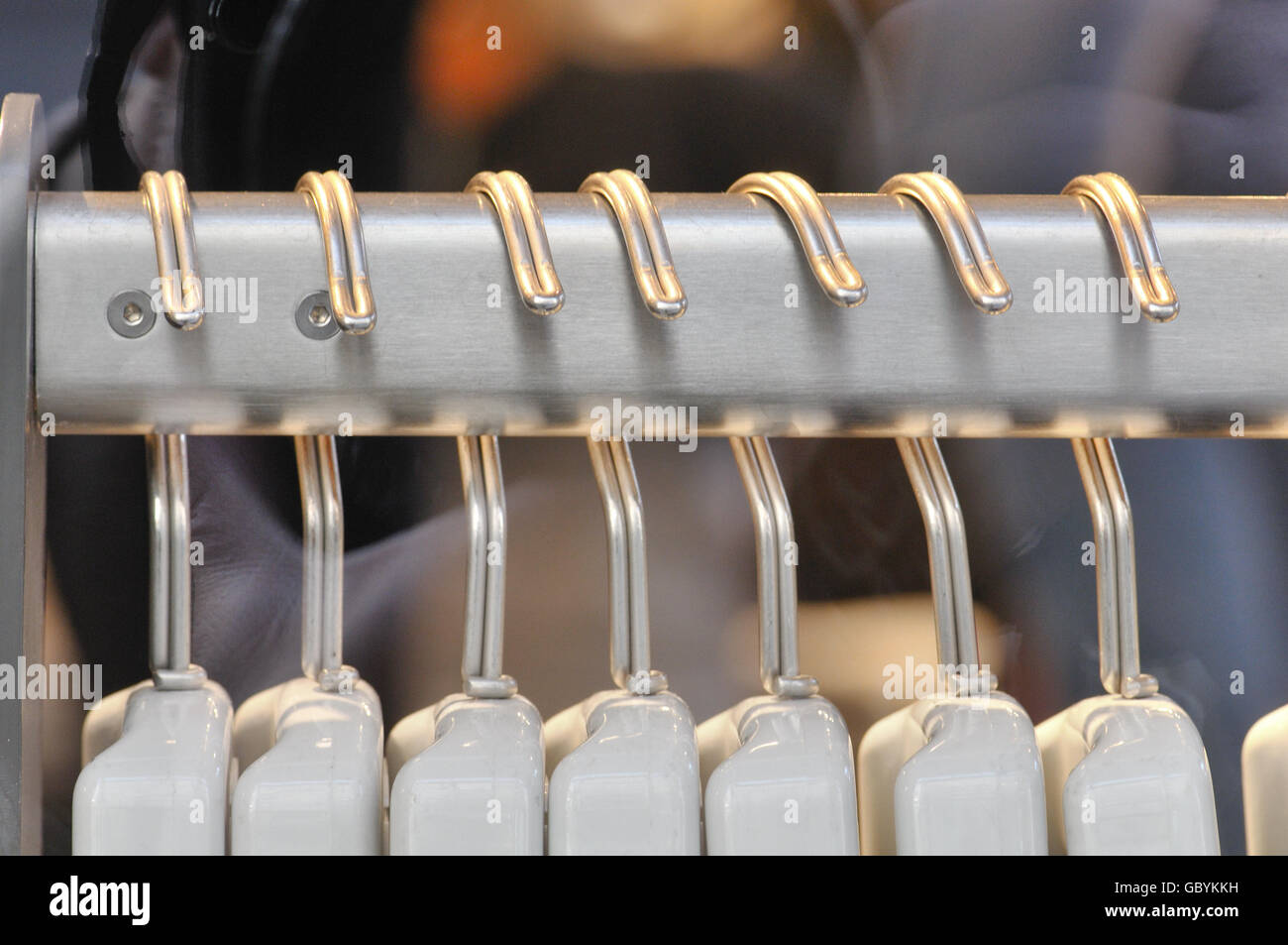 Hangers in a clothes store Stock Photo - Alamy