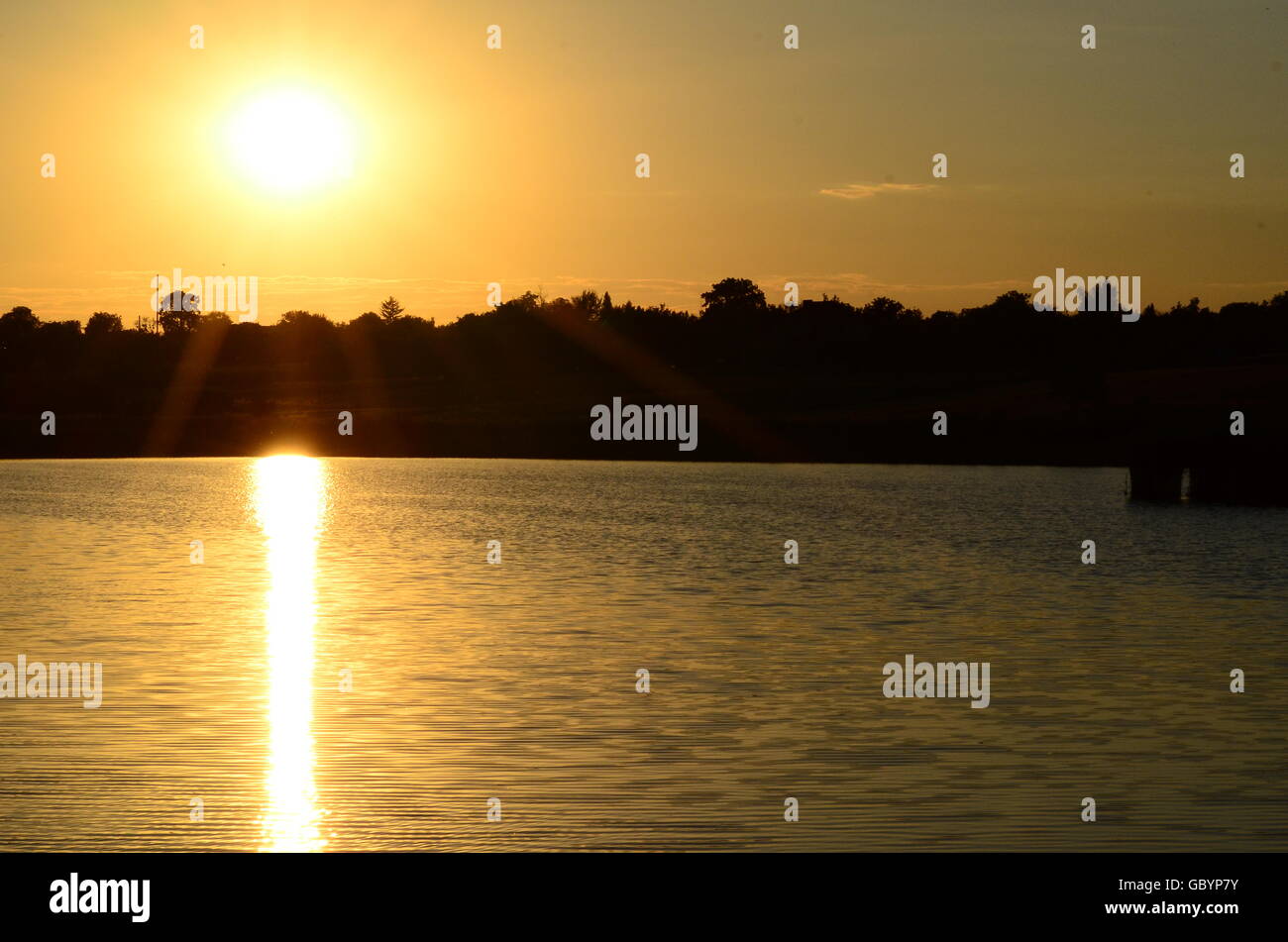 sunset on the river Stock Photo - Alamy
