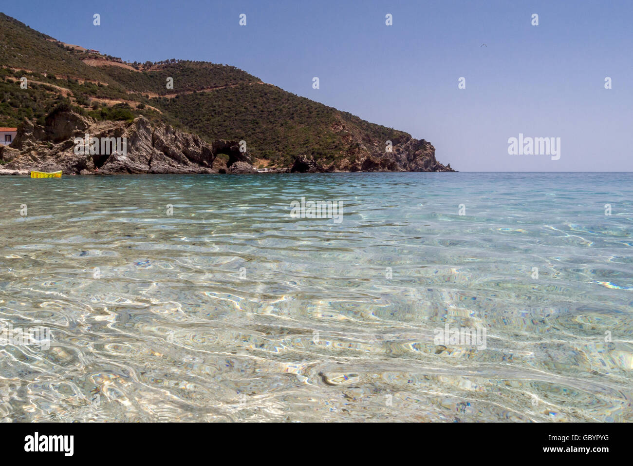 Beach scenes on a Greek island in the summer Stock Photo - Alamy