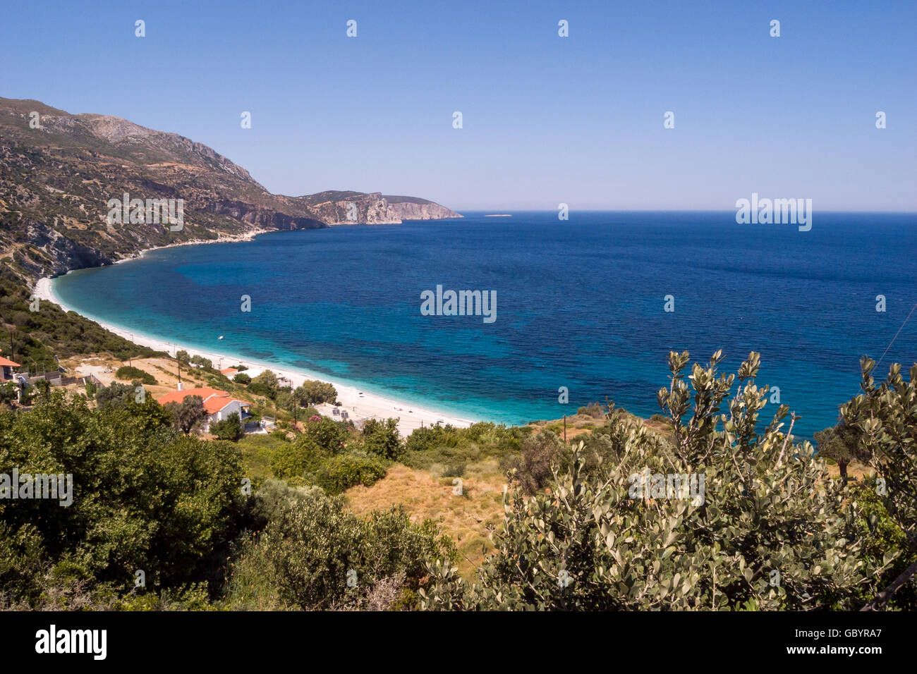Beach scenes on a Greek island in the summer Stock Photo - Alamy