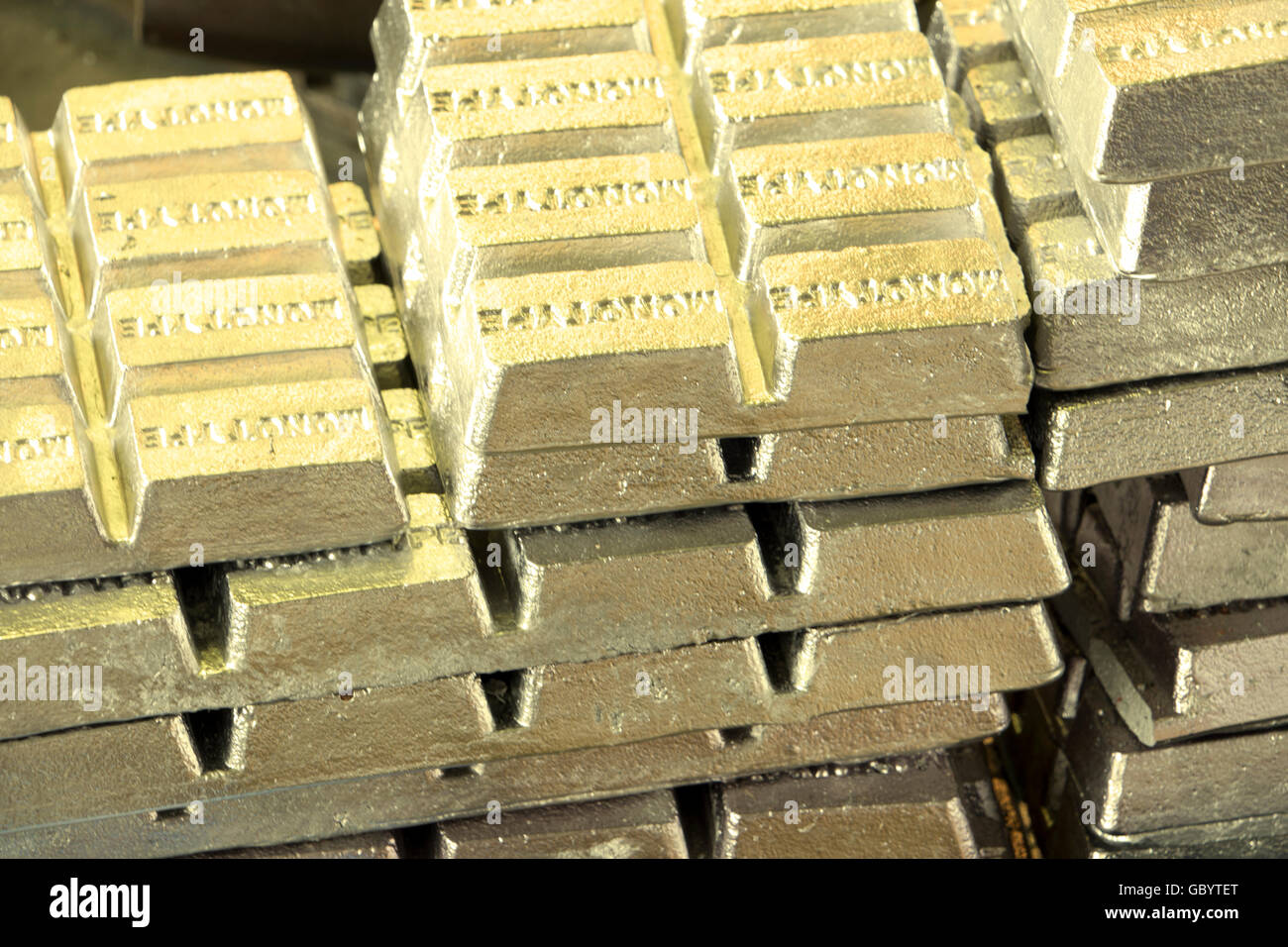 A big pile of golden metal bars Stock Photo - Alamy