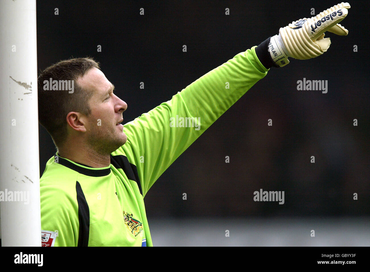 Wigan athletic goalkeeper john filan communictes with his defence hi ...