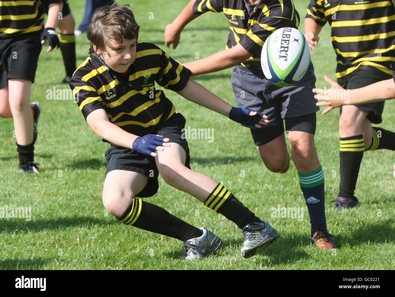 youngsters play rugby during a summer Rugby Festival at Greenyards in ...
