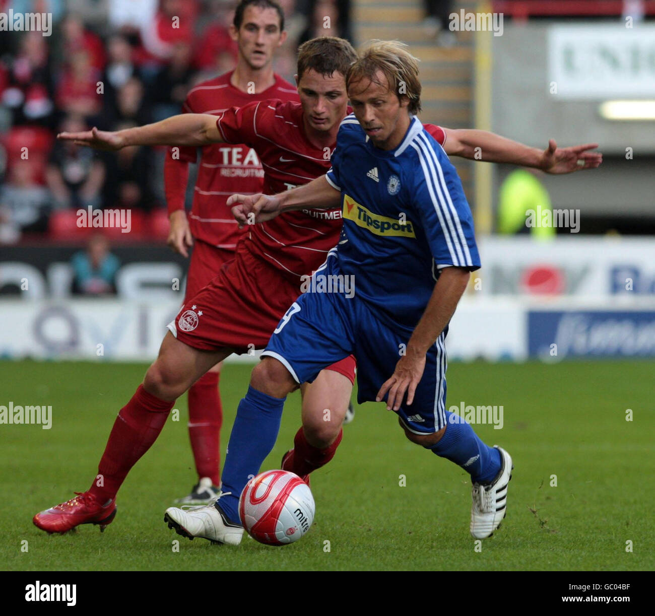 Aberdeen's Gary McDonald holds off Sigma Olomouc's Rudolf Otepka during ...