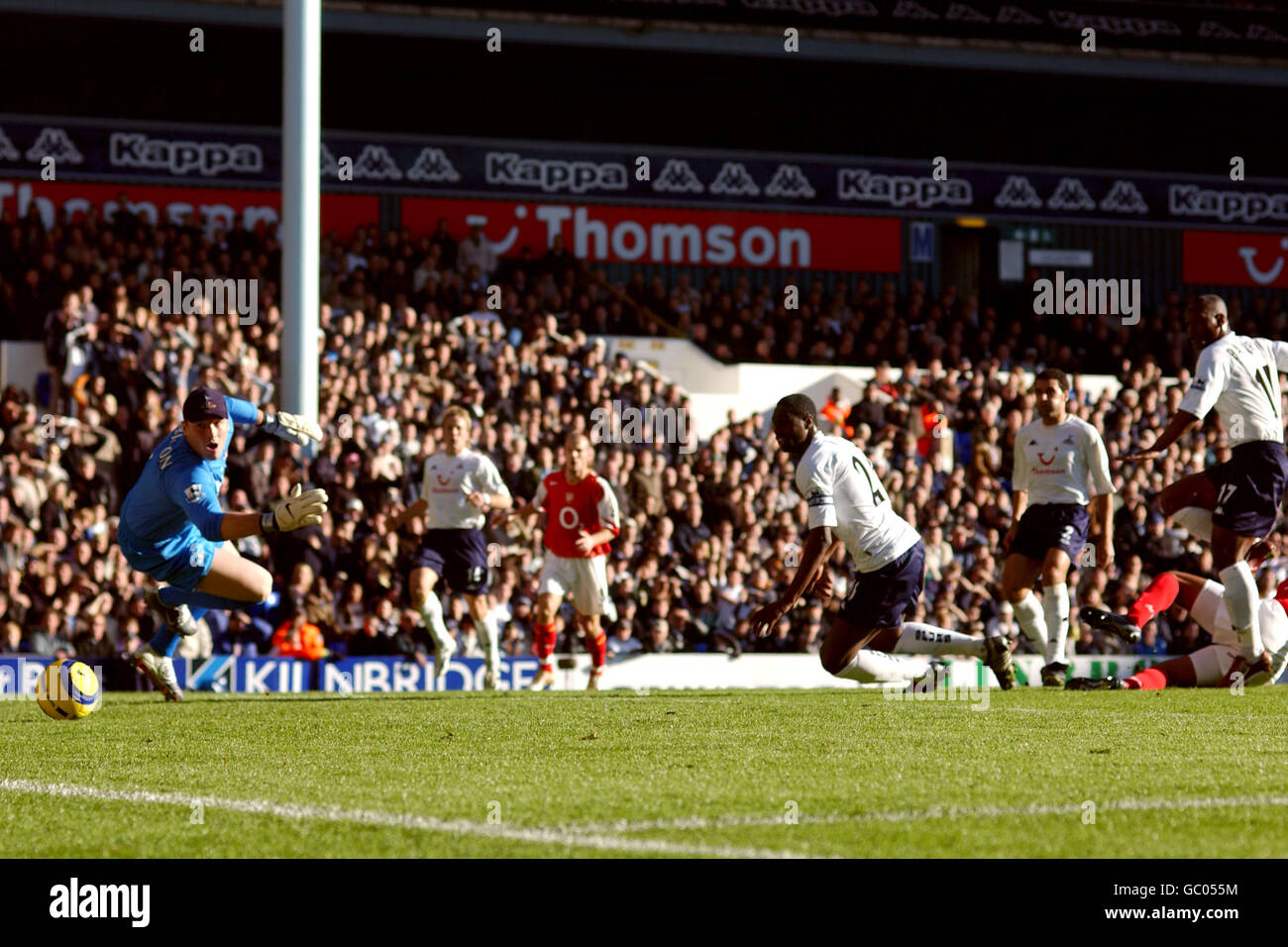 Arsenal's Thierry Henry scores their equalising goal past Tottenham ...