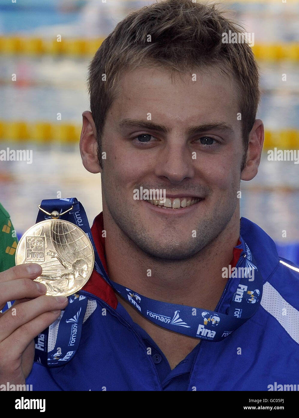 Great Britain's Liam Tancock with his gold medal after winning the Men ...