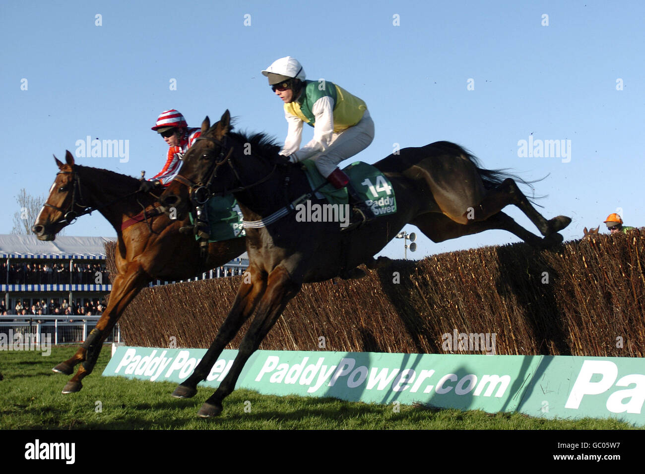 Jockey Sam Thomas on Kelrev leads from Dominic Elsworth on Better Days ...