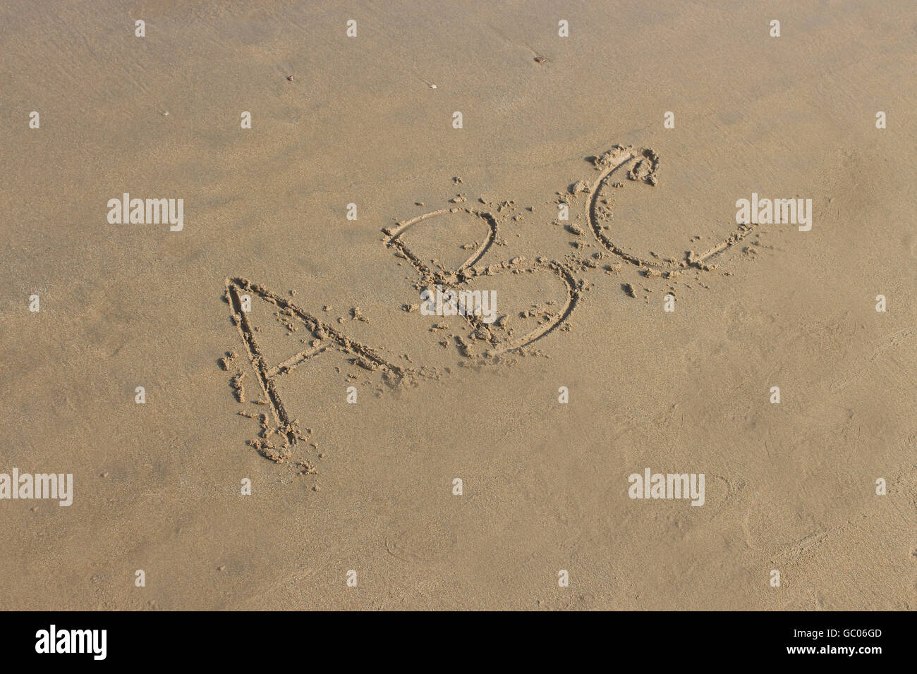 ABC written on sea beach. English alphabet are shown on the beach Stock ...