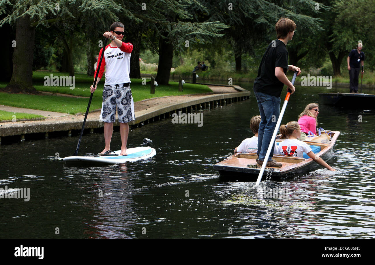 Rowland Gurner, instructor at Fen Paddle takes his Paddle Board past a ...