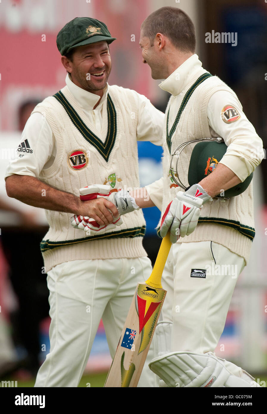 Australia's Michael Clarke is congratulated by captain Ricky Ponting ...