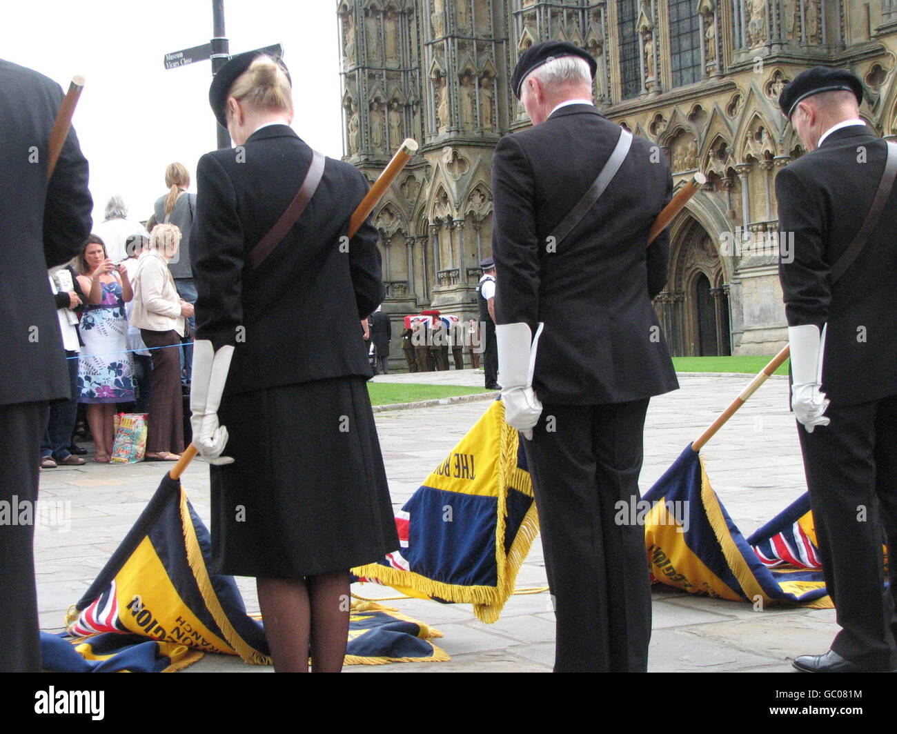 Standard bearers lower their standards as the coffin of Harry Patch ...