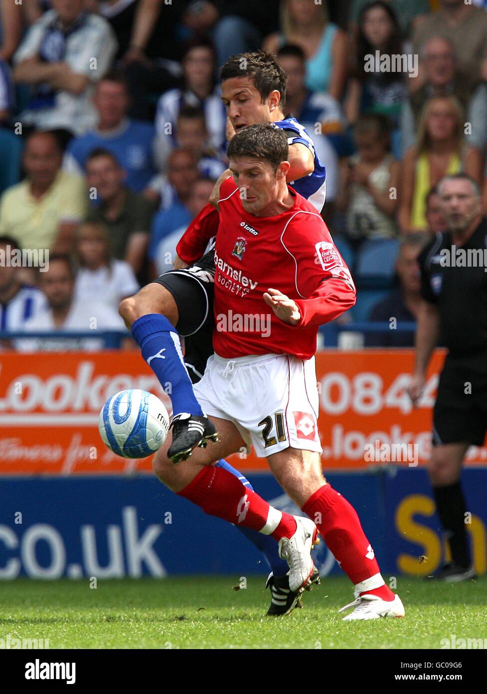 Sheffield Wednesday's Richard Wood and Barnsley's Jonathan Macken ...