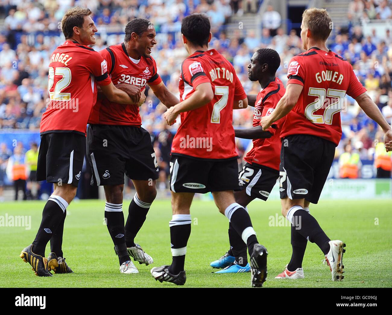 Swansea City 's Ashley Williams celebrates after scoring the opening ...