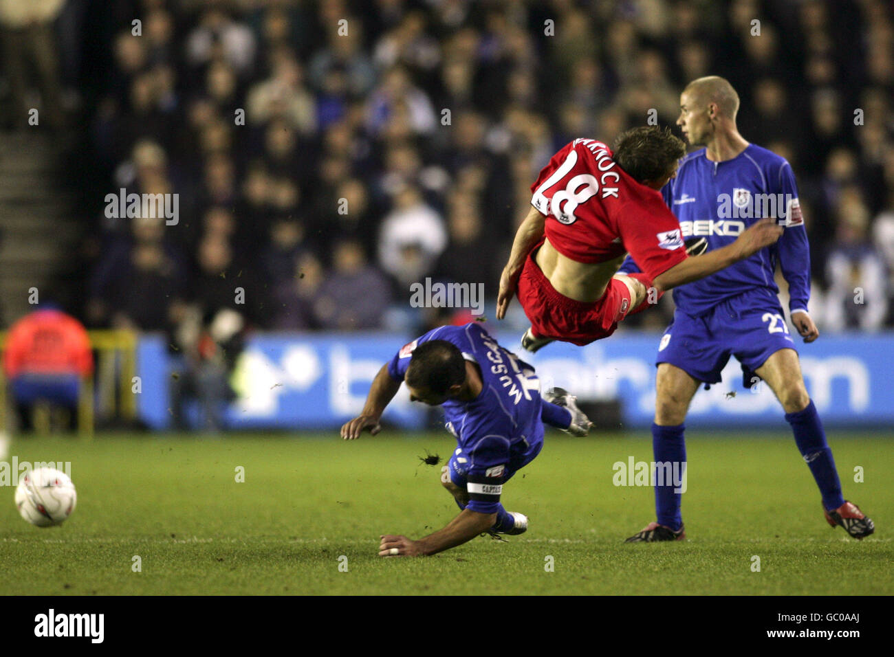 (L-R) Millwall's Kevin Muscat upends Liverpool's Stephen Warnock Stock ...