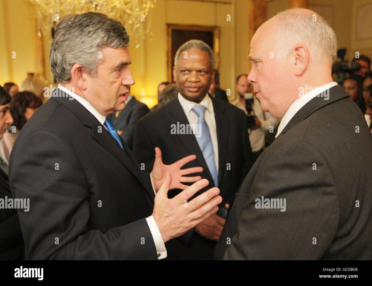 Prime Minister Gordon Brown (left) talks to Barry Mizen (right) as ...