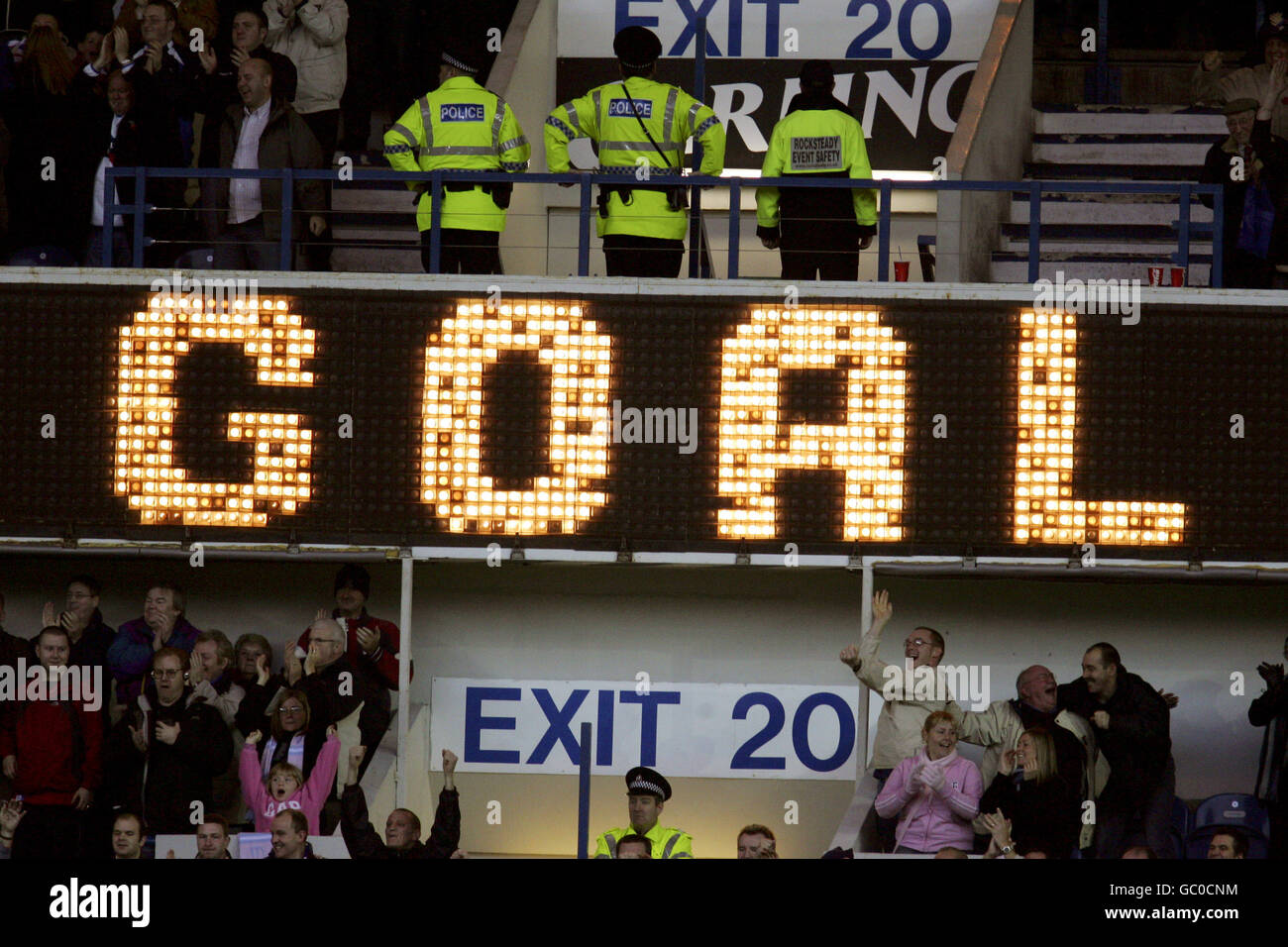 The scoreboard at Ibrox signals that there has been a goal Stock Photo ...