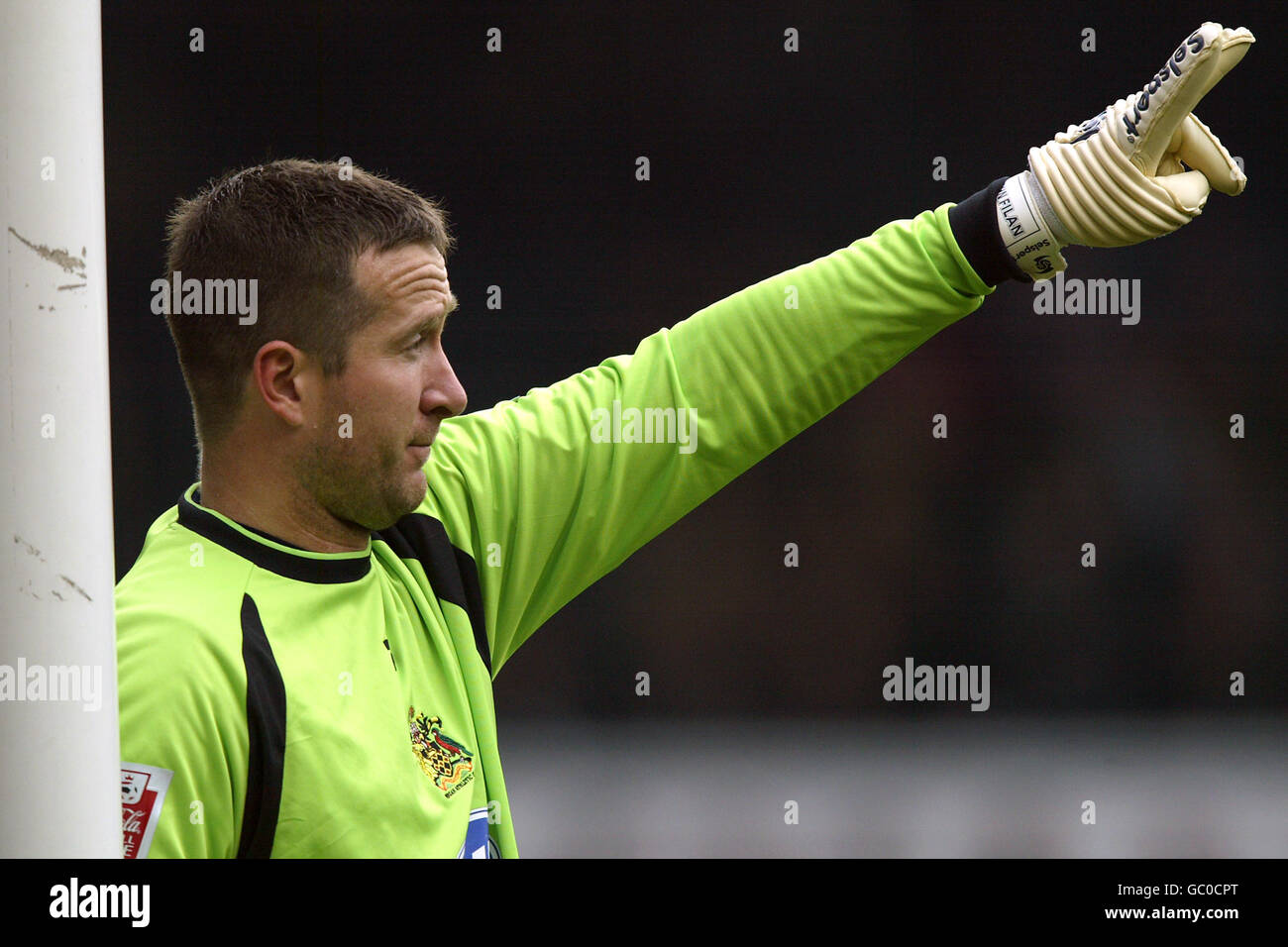 Wigan athletic goalkeeper john filan communictes with his defence hi ...