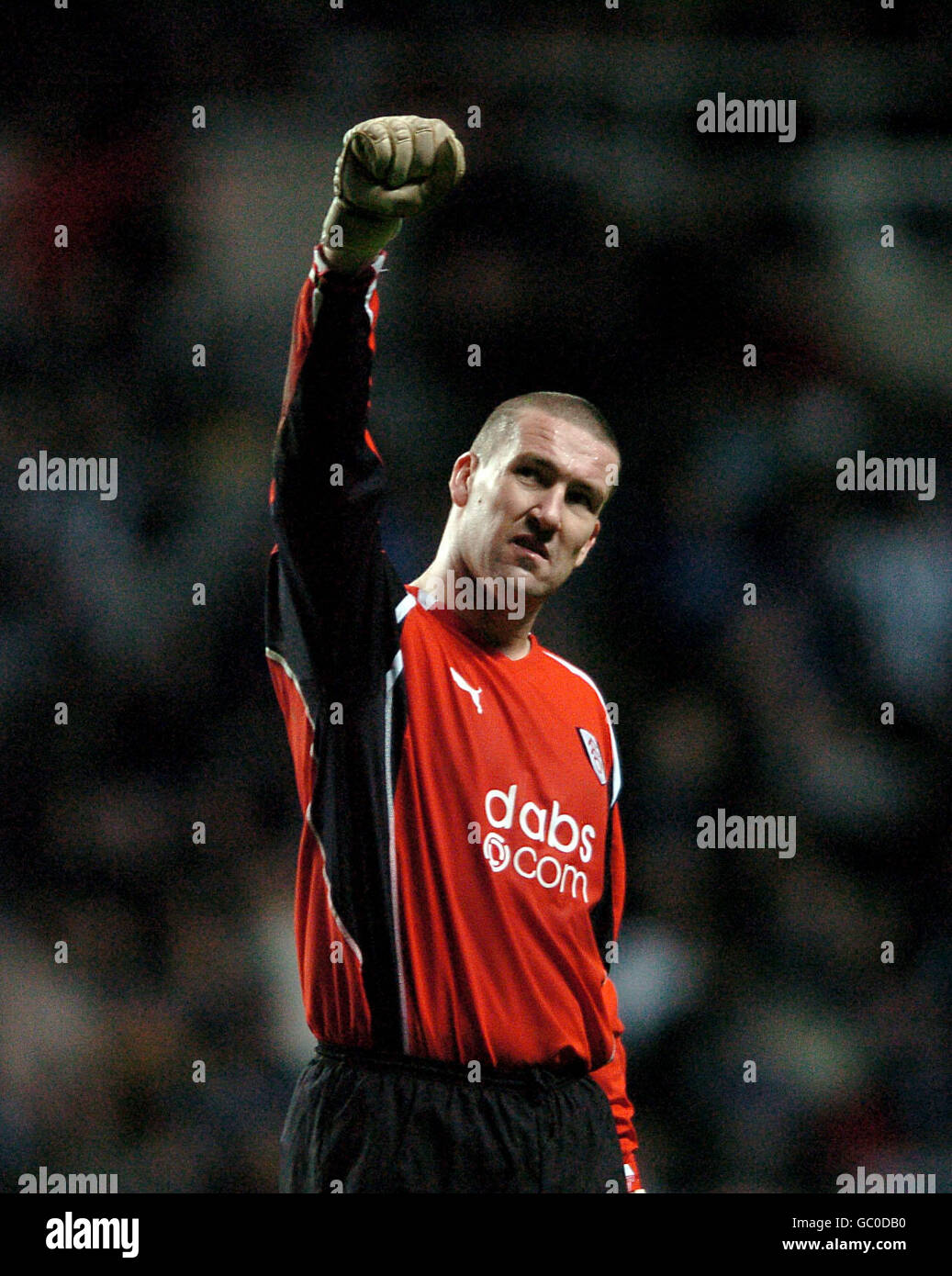 Fulham goalkeeper Mark Crossley celebrates victory at the end of the ...