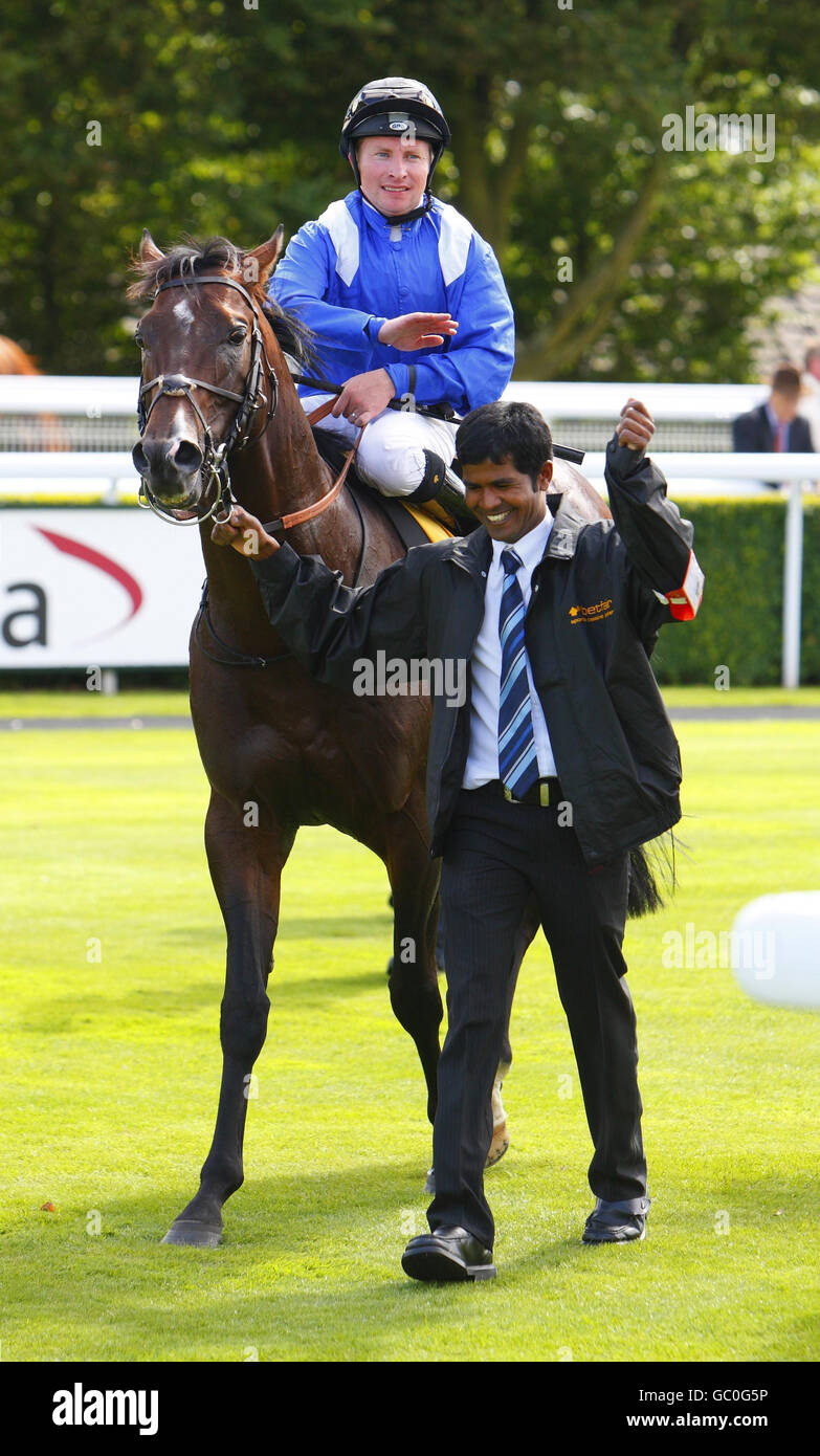 Tadhg O'Shea and Finjaan return to the winner's enclosure after winning ...