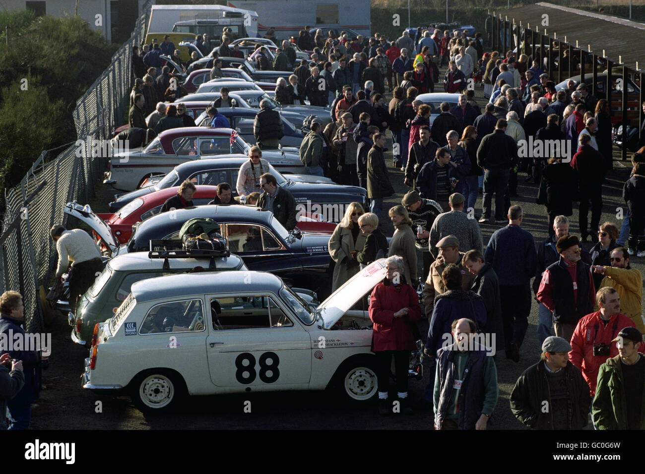 The crowds view competitor's cars at Brooklands in Surrey. 180 entrants ...