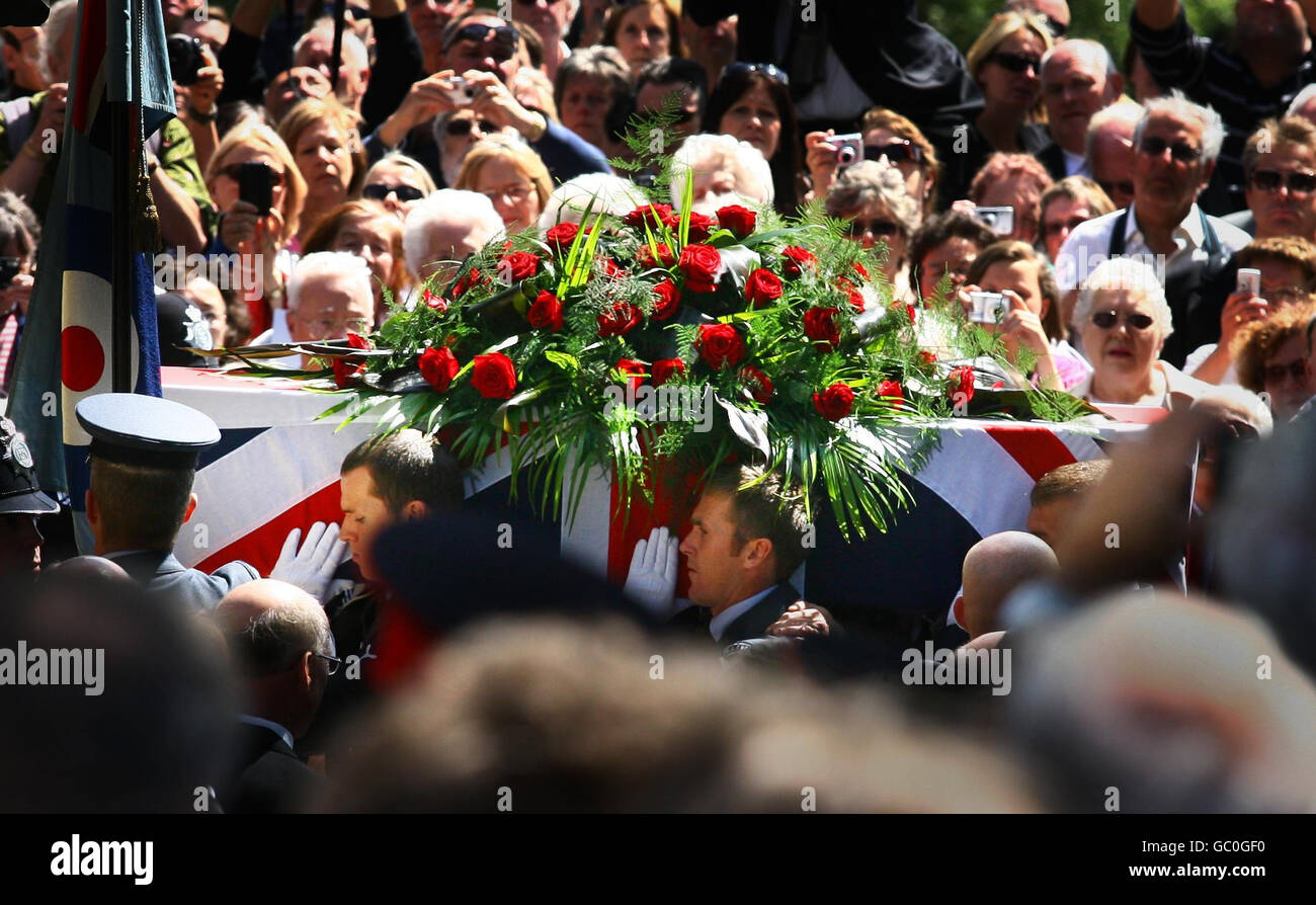 The coffin is carried into St. Nicholas' Church in Brighton, East ...