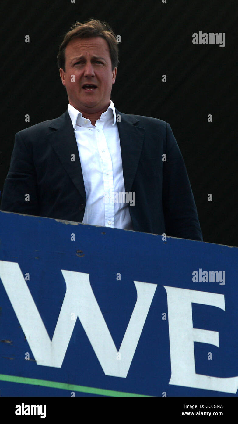 Conservative Party Leader David Cameron in the stands as rain and bad ...