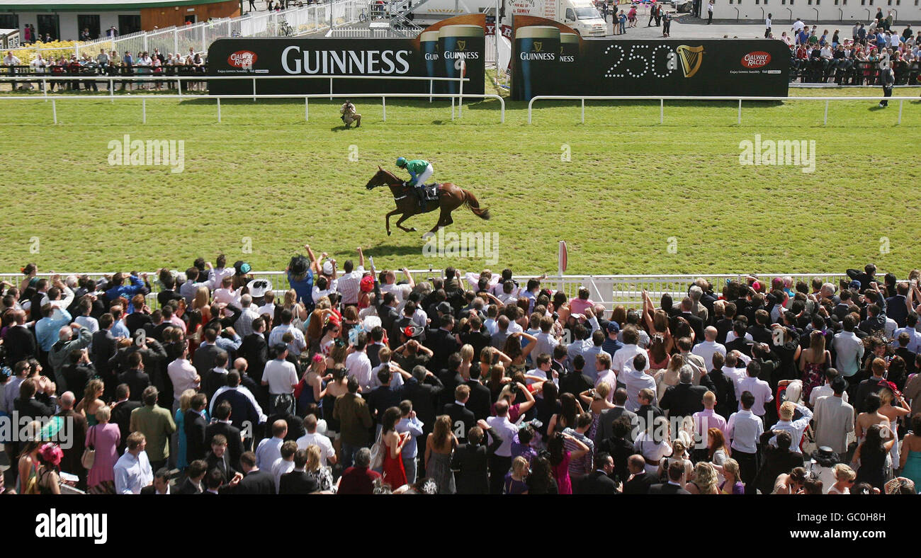 Roger Loughran crosses the line on Montero to win the St James Gate ...