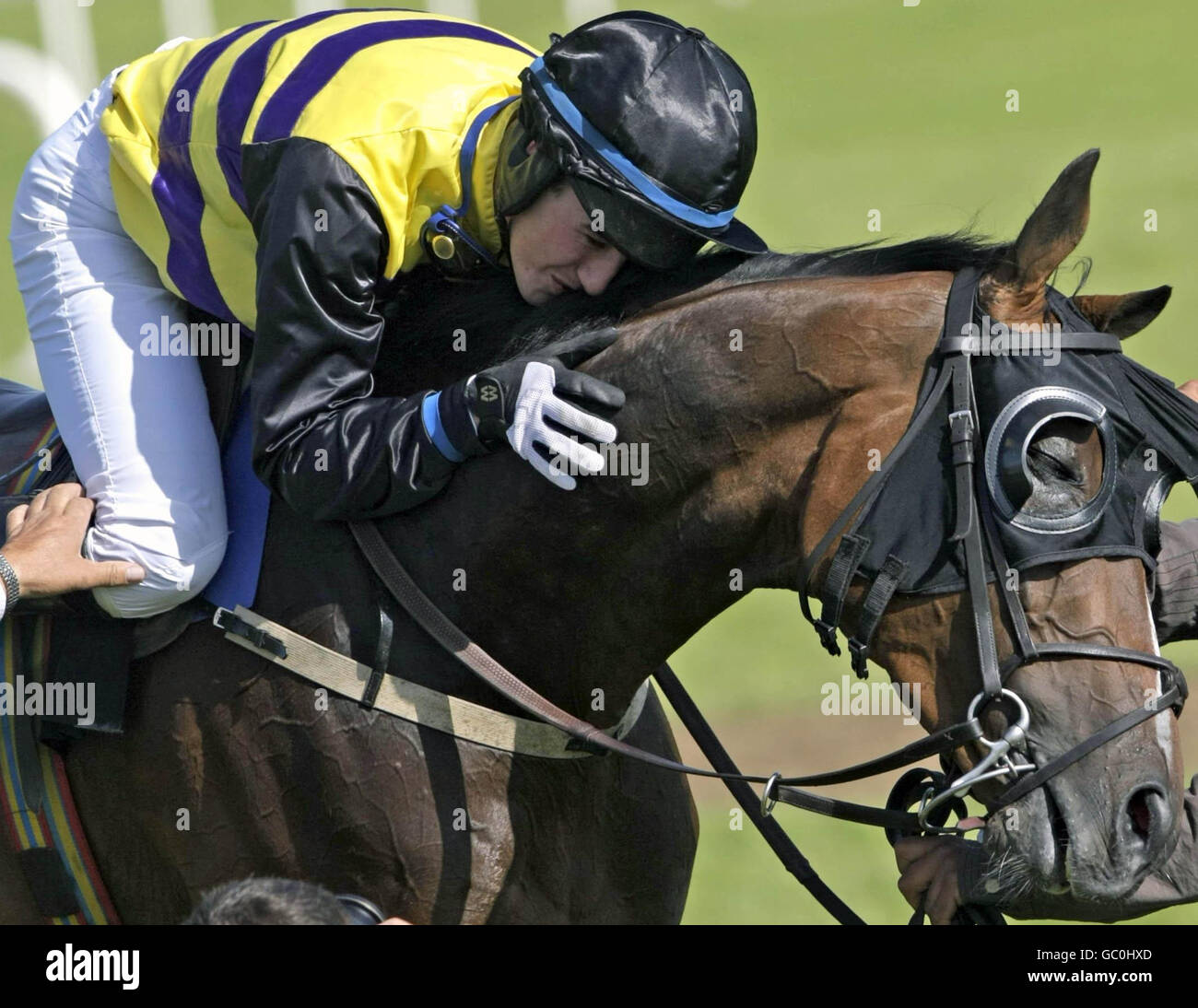 Jockey Steven Gray kisses Bahrain Storm after victory in the the Arther ...