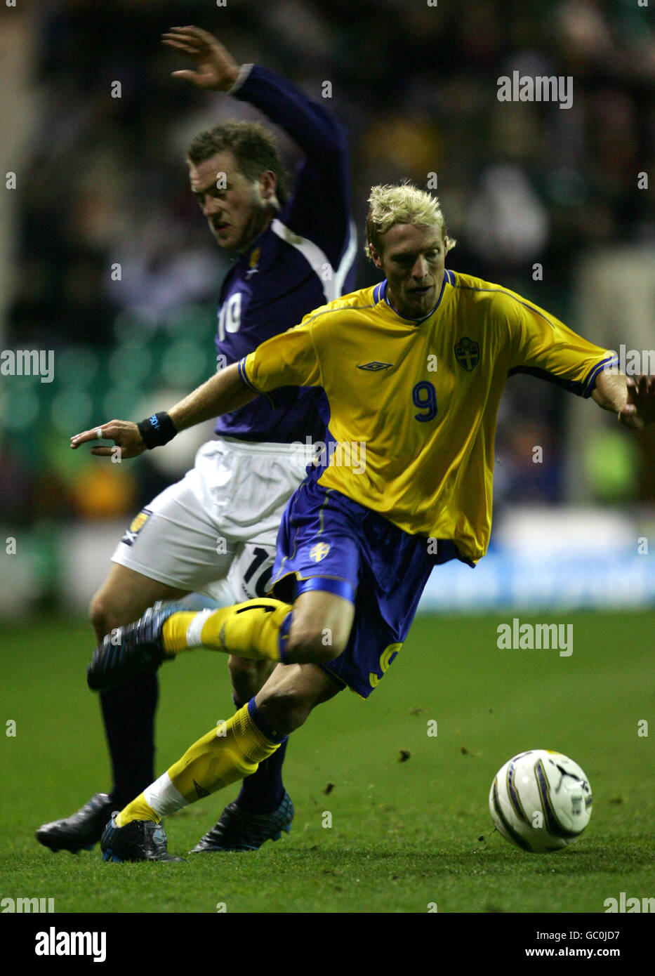 Scotlands james mcfadden and swedens christian wilhelmsson hi-res stock ...