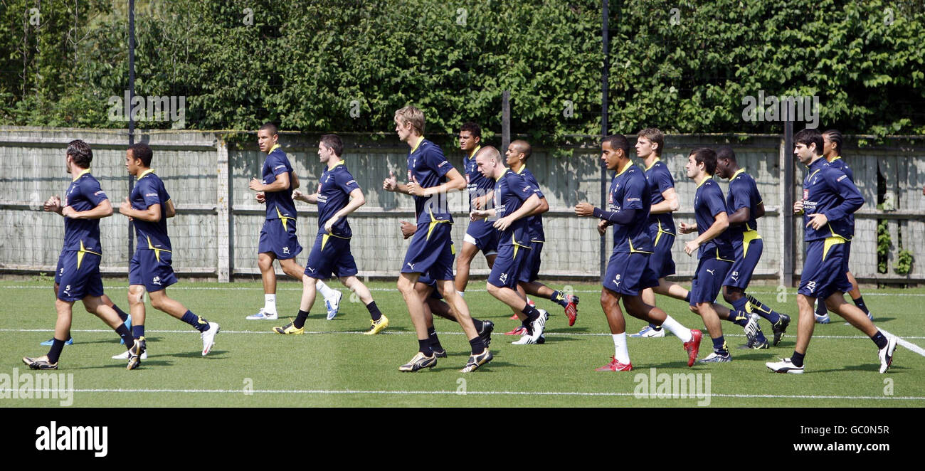 Tottenham's Peter Crouch trains with his new team mates during the Pre ...
