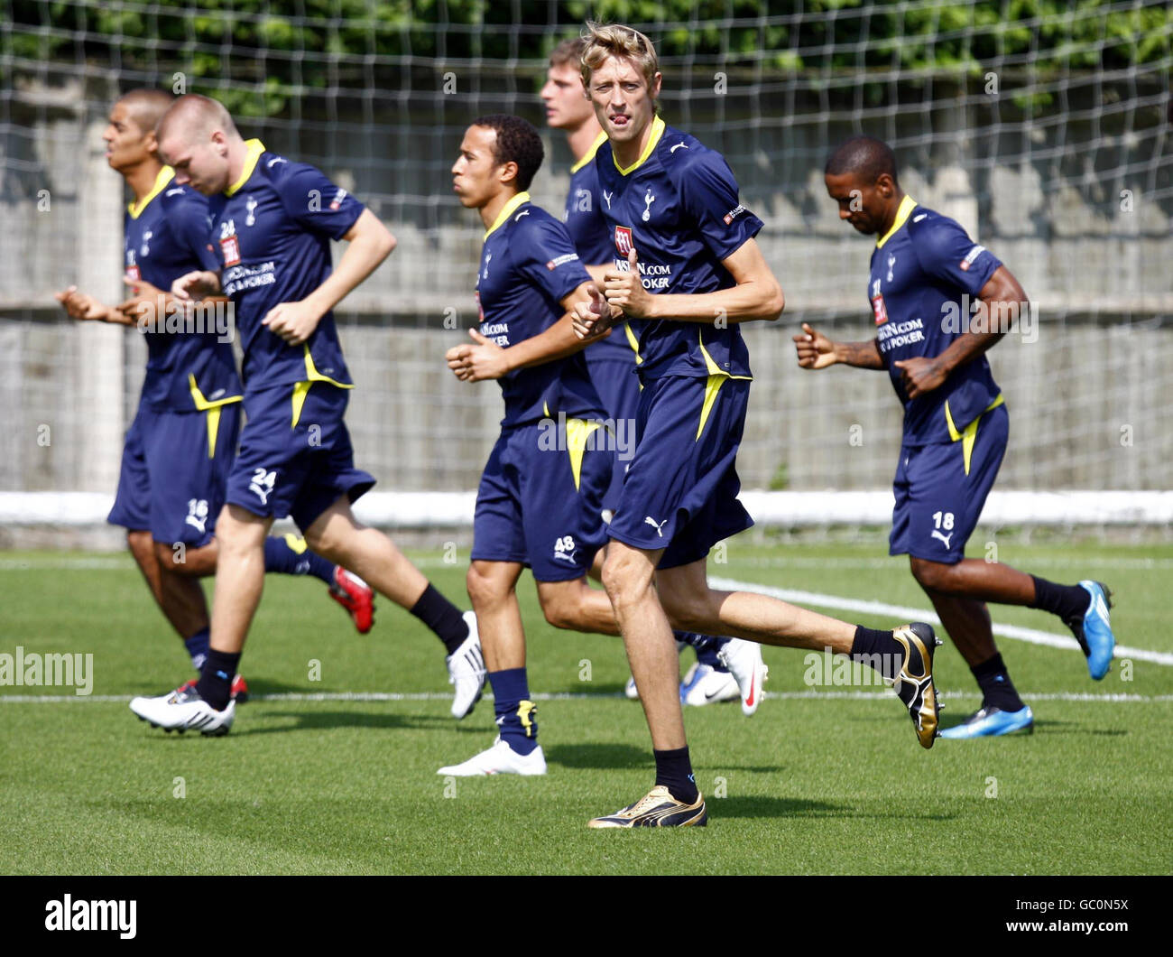 Tottenham's Peter Crouch trains with his new team mates during the Pre ...